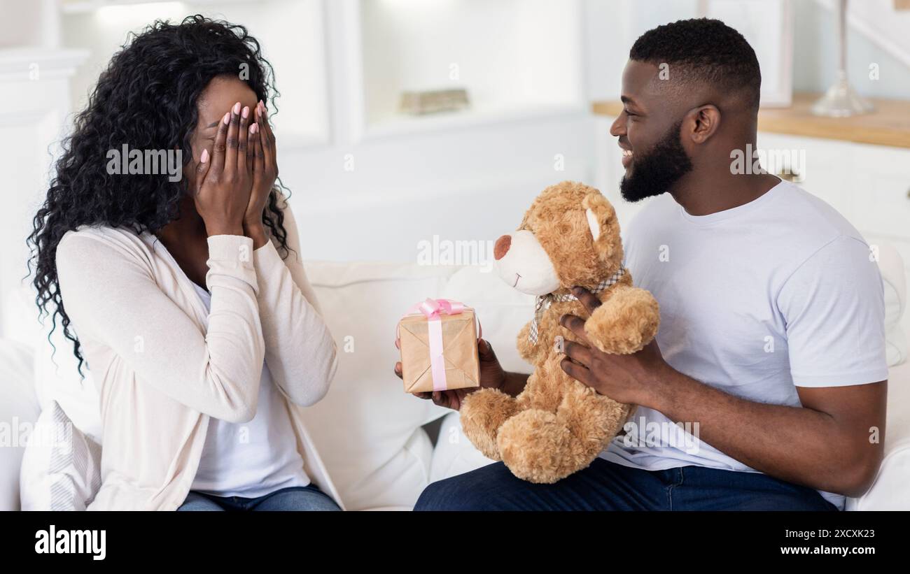 Black boyfriend surprises girlfriend hi-res stock photography and ...