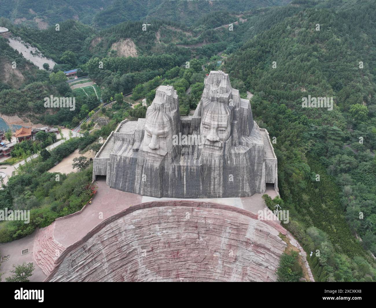 ZHENGZHOU, CHINA - JUNE 16, 2024 - A giant statue of Emperor Yan and ...