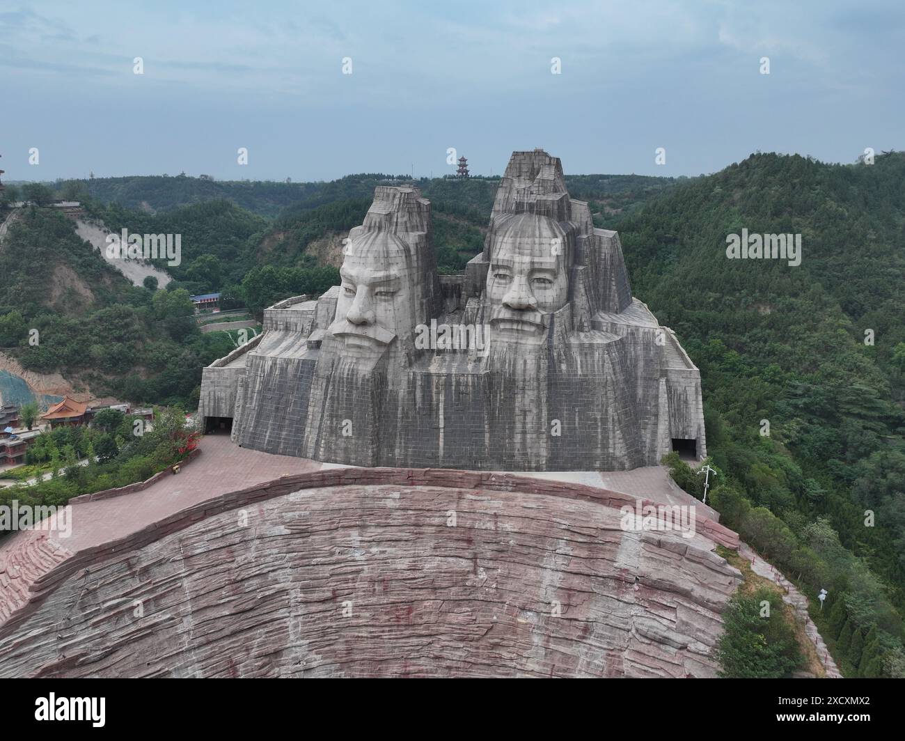 ZHENGZHOU, CHINA - JUNE 16, 2024 - A giant statue of Emperor Yan and ...