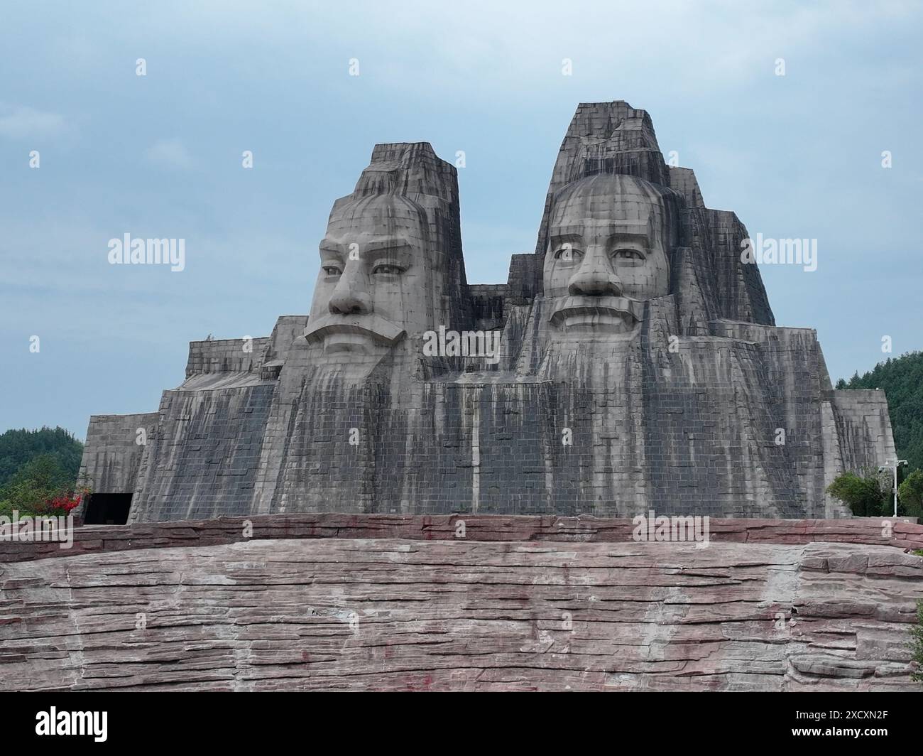 ZHENGZHOU, CHINA - JUNE 16, 2024 - A giant statue of Emperor Yan and Emperor Huang in Zhengzhou ...