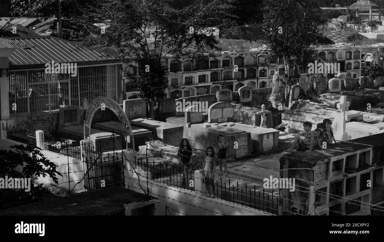 Children living in cemetery Stock Photo - Alamy