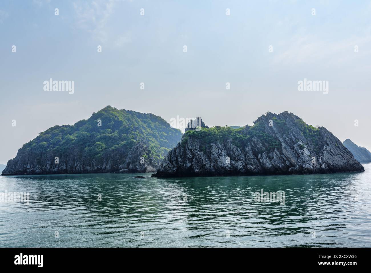Scenic karst isle in the Ha Long Bay, Vietnam. The Halong Bay is a ...