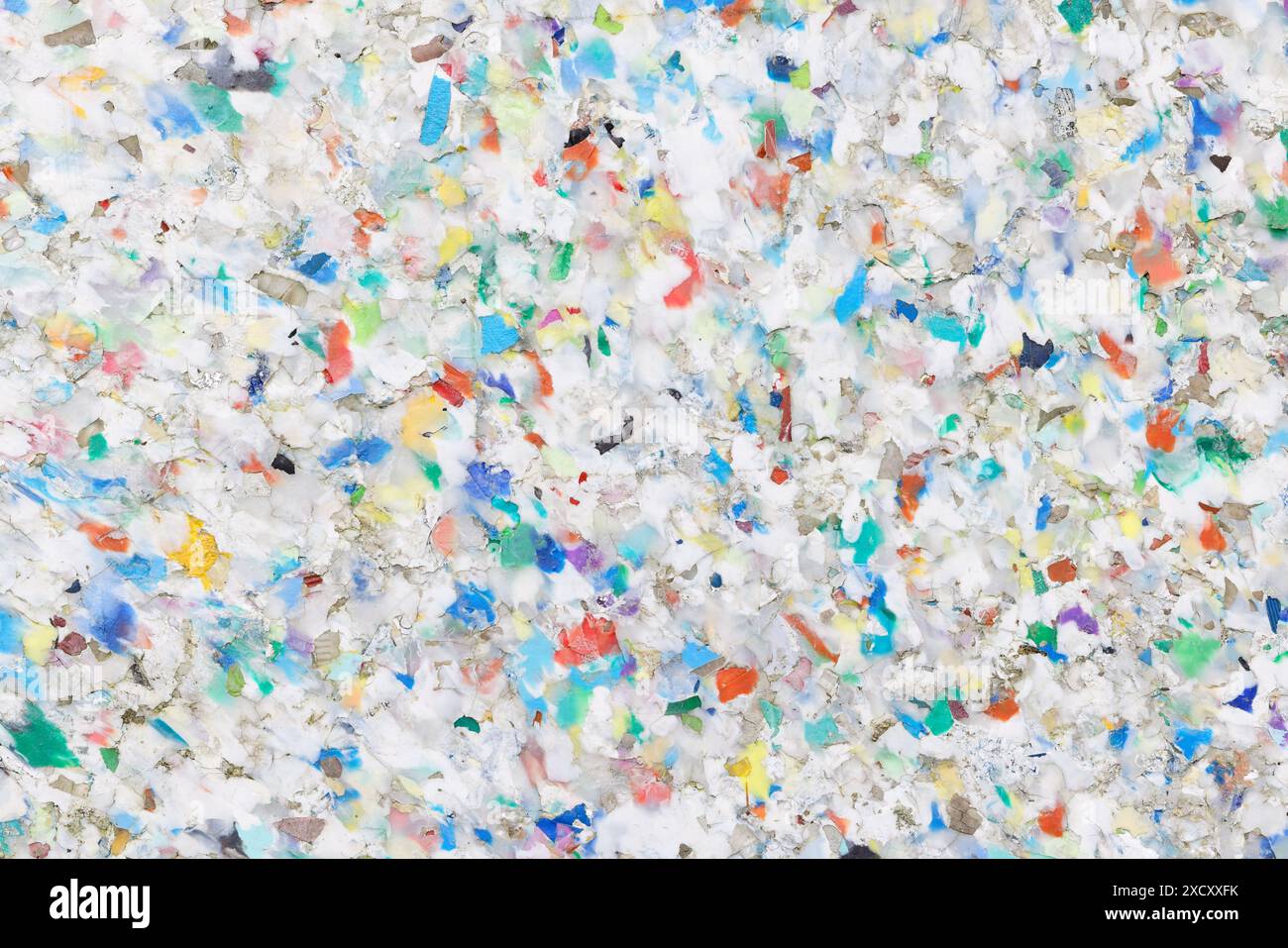 recycling plastic background closeup with conglomerated plastic and ...