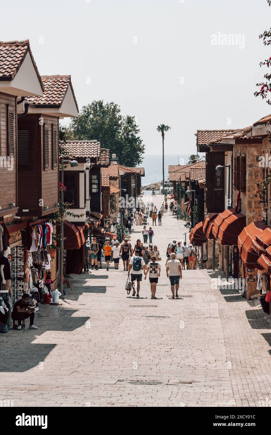 People on the main street walking to the marina in the historic city of ...