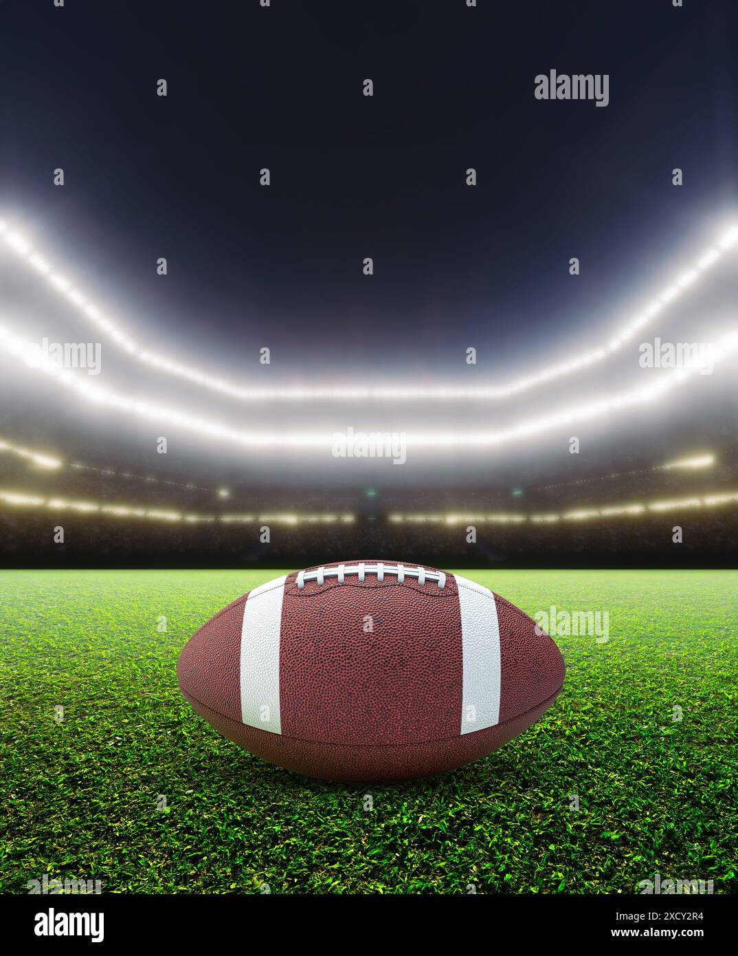 A generic seated american football stadium showing a ball on a green ...