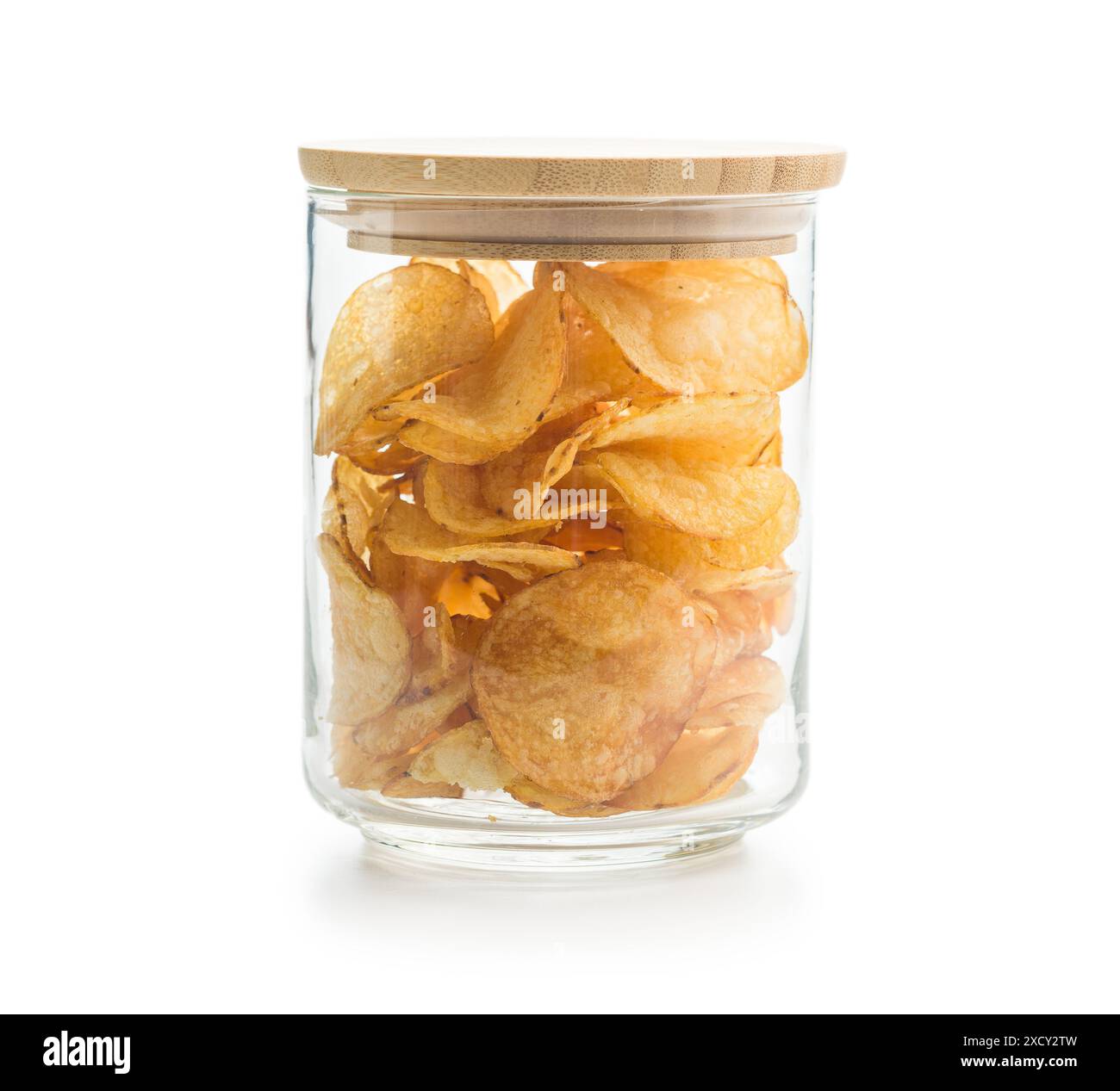 Close Up of Crispy Potato Chips in jar isolated on a White Background ...