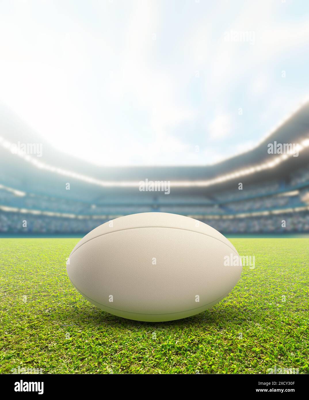 A generic seated rugby stadium showing a rugby ball on a green grass ...