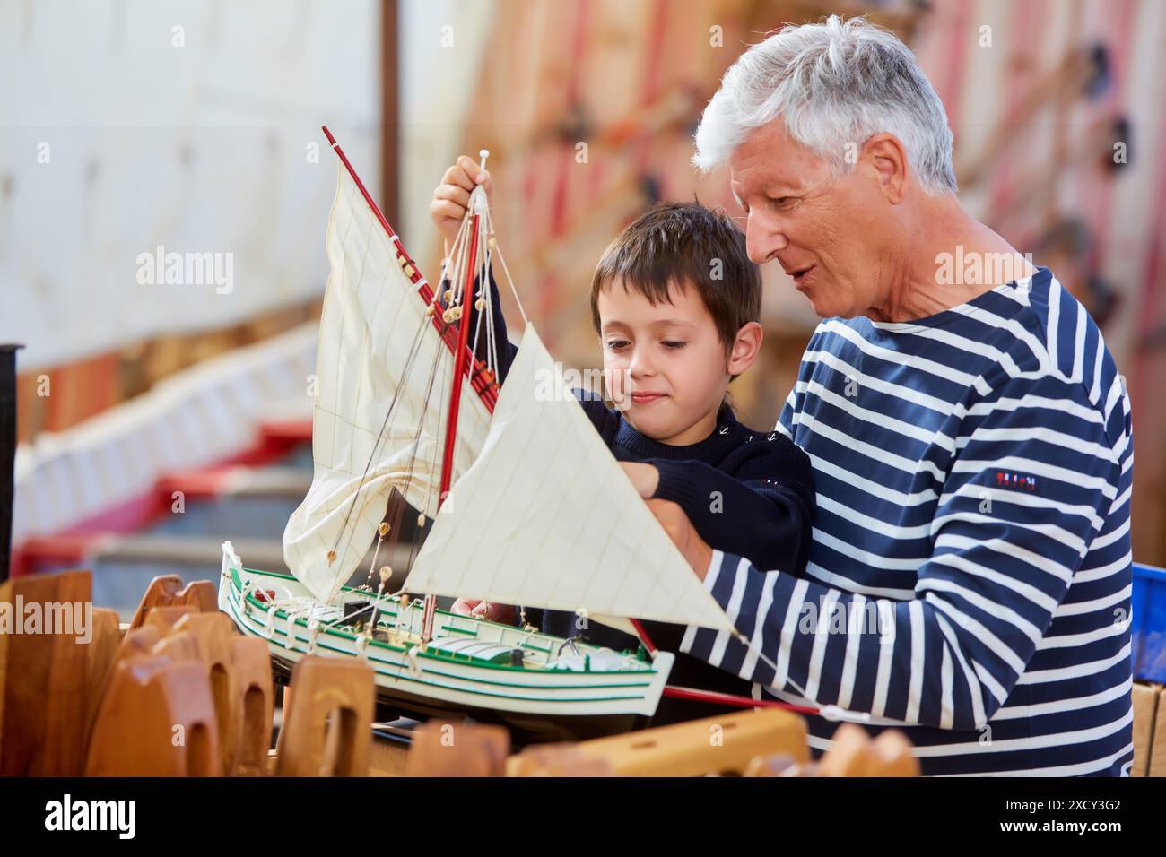 Grandfather and grandson, Building model sailboat, Whaleship, Pasaia ...
