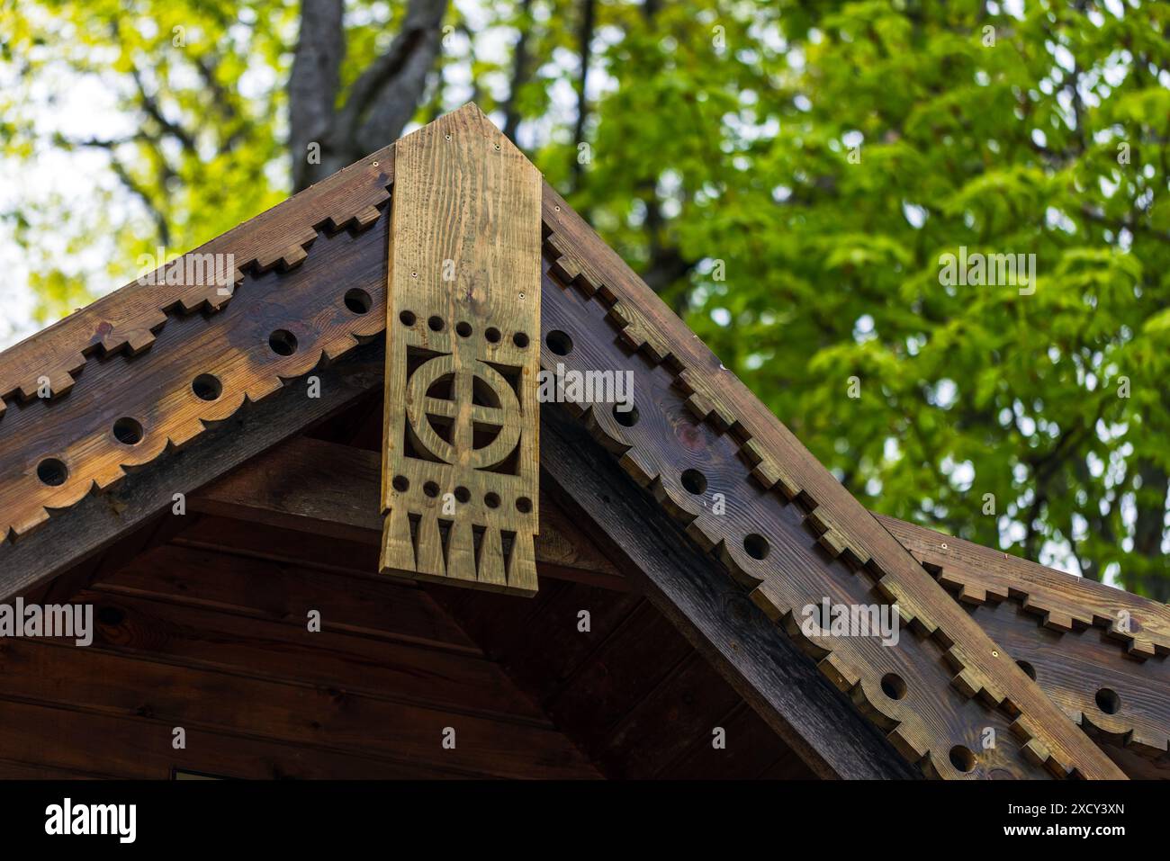 Slavic wooden decoration elements on the gable of rural log house Stock ...