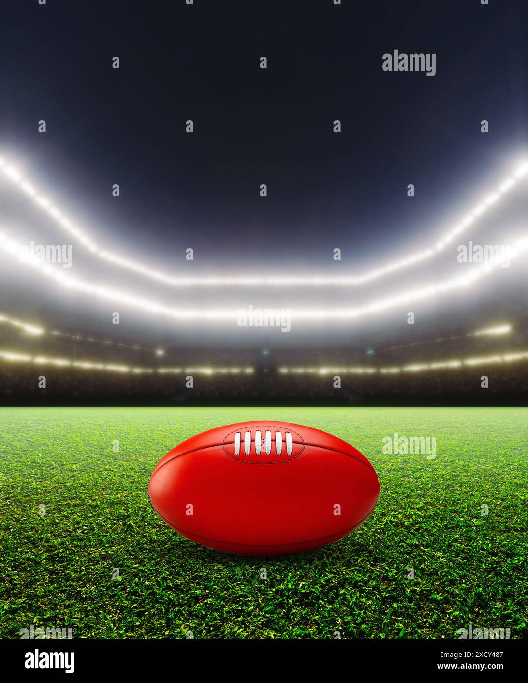 A generic seated aussie rules stadium showing an orange ball on a green ...