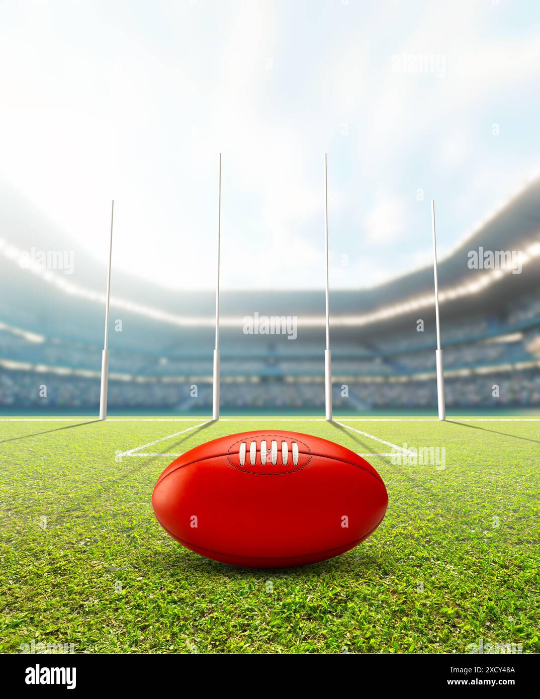 A generic seated aussie rules stadium showing goal posts and a ball on ...