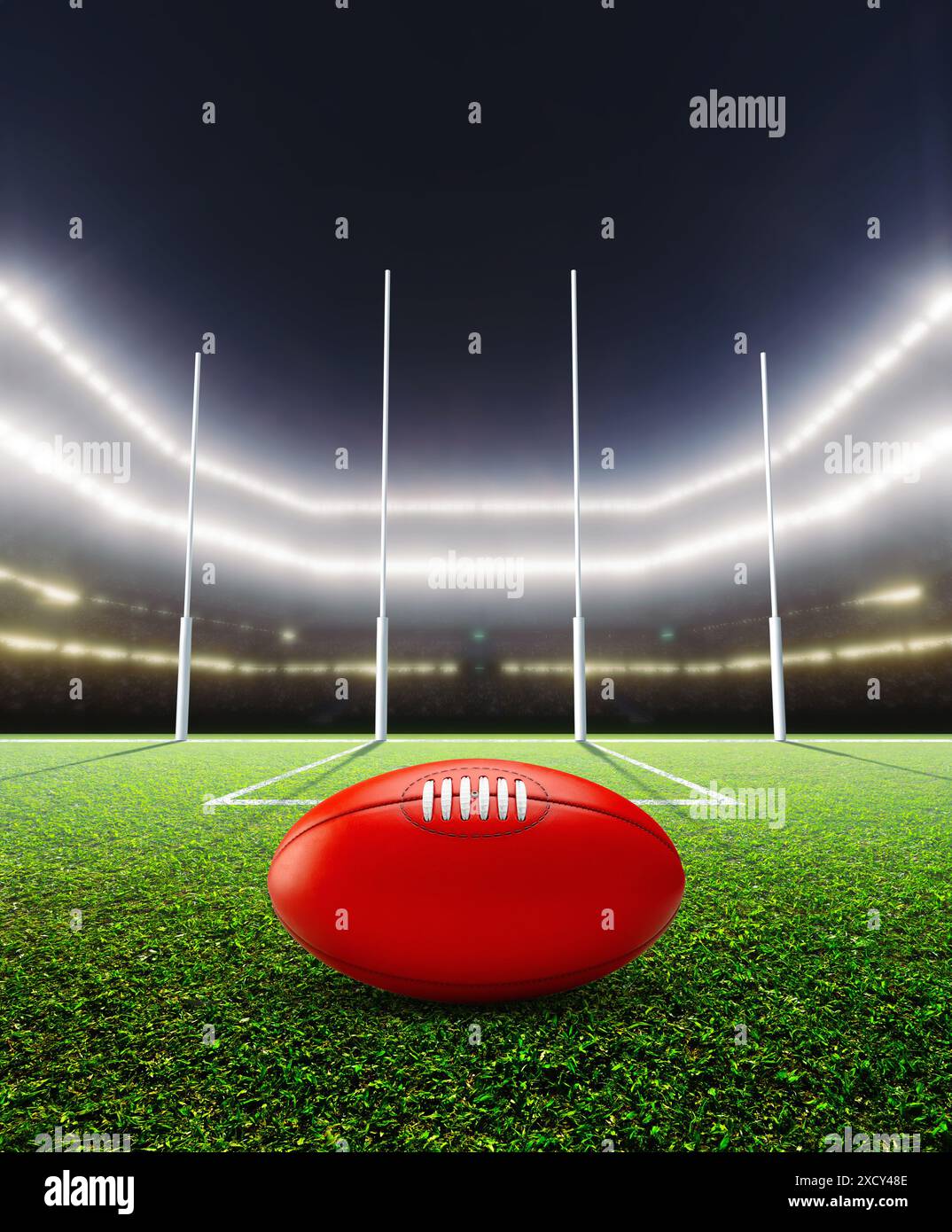 A generic seated aussie rules stadium showing goal posts and a ball on ...