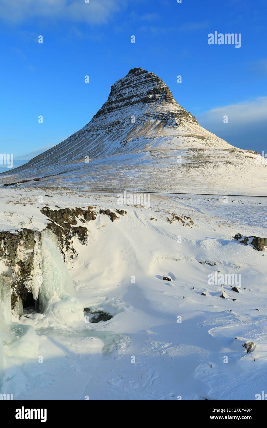 Iced kirkjufellsfoss cascade and kirkjufell mount hi-res stock ...