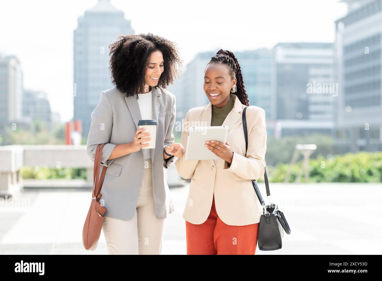 Professional women discussing outdoors hi-res stock photography and ...