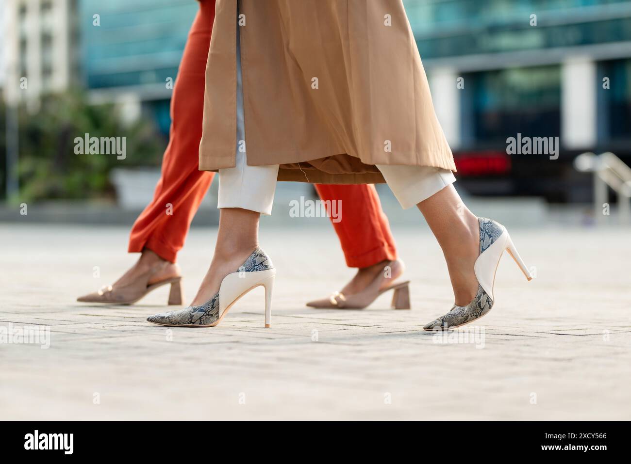 Two businesswomen walking legs hi-res stock photography and images - Alamy