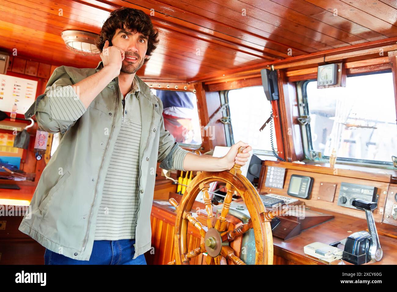 Sailor at the helm of a sailboat, galleon. Basque Country. Spain Stock ...