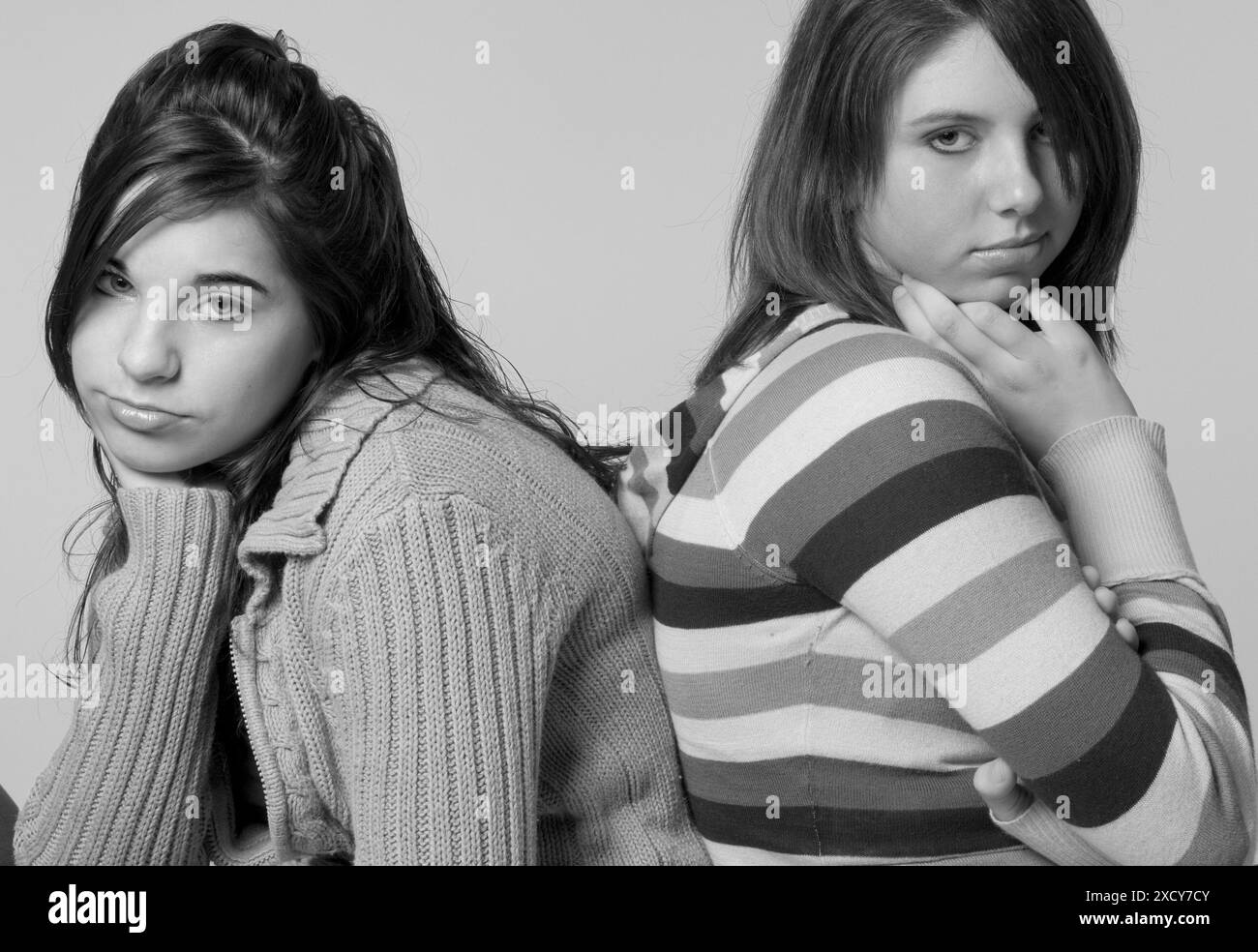Two Caucasian teen girlfriends showing resentment and anger, USA Stock ...