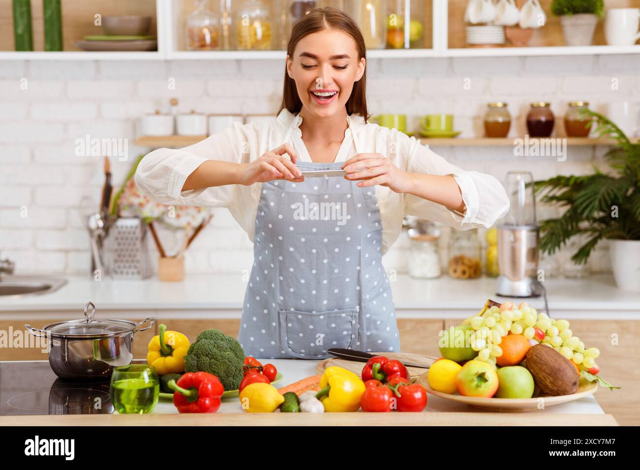 Happy Blogger Making Photo Of Healthy Food Stock Photo - Alamy