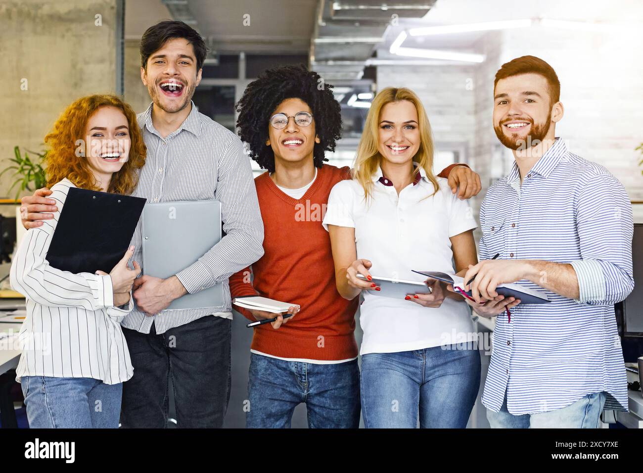 Group people posing in hi-res stock photography and images - Alamy