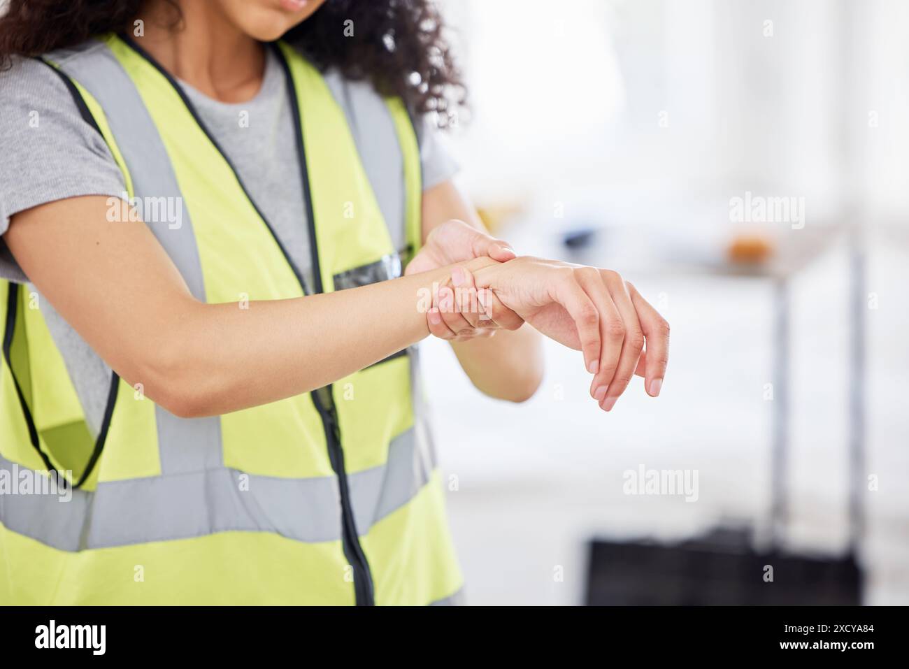 Construction, DIY and wrist pain with woman in home for decoration ...