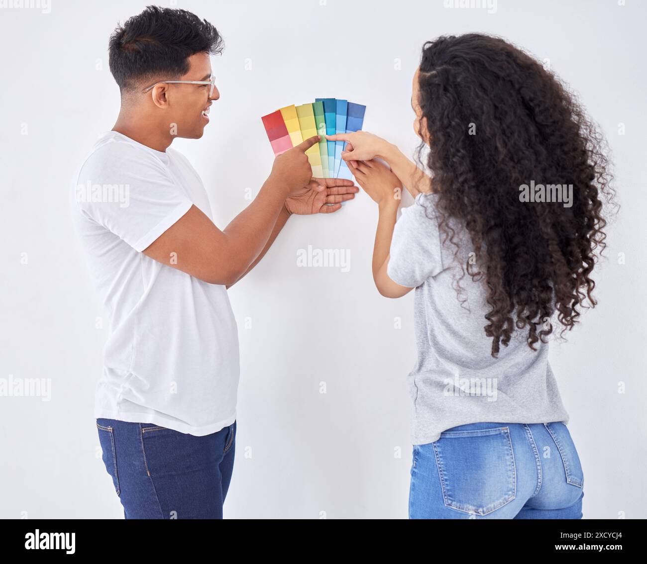 Couple, color choice and painting swatch in home, diy and house ...