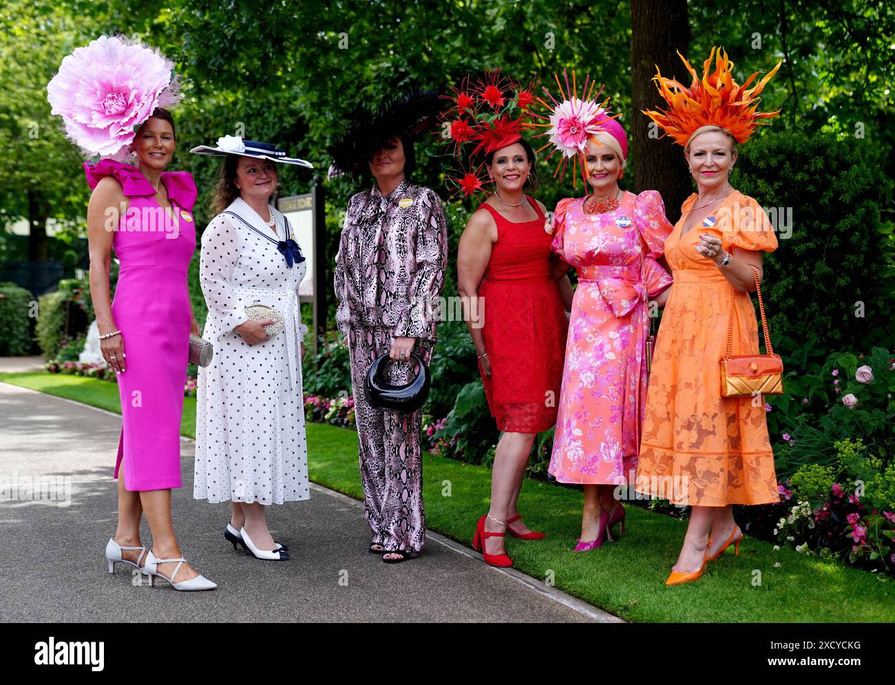 Rachel Ellis Oates, Vivienne Jenner and other racegoers pose for a ...