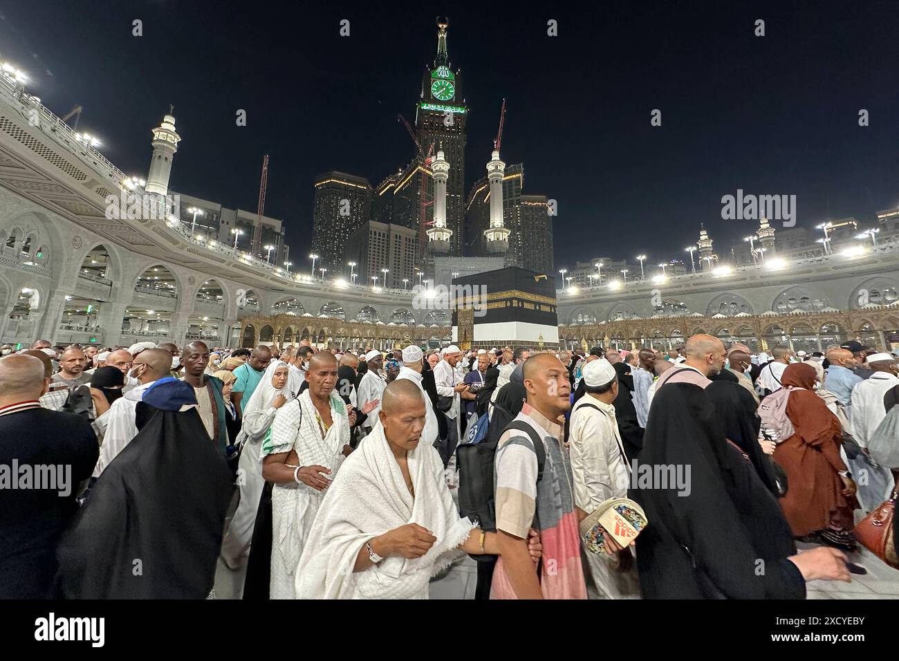 Muslim pilgrims gather to perform the farewell circumambulation or tawaf , circling seven times ...
