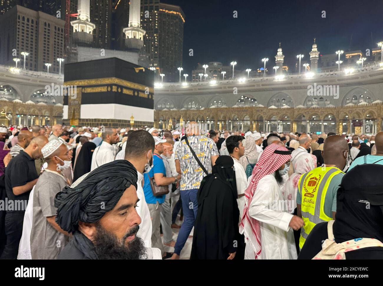 Muslim pilgrims gather to perform the farewell circumambulation or tawaf , circling seven times ...