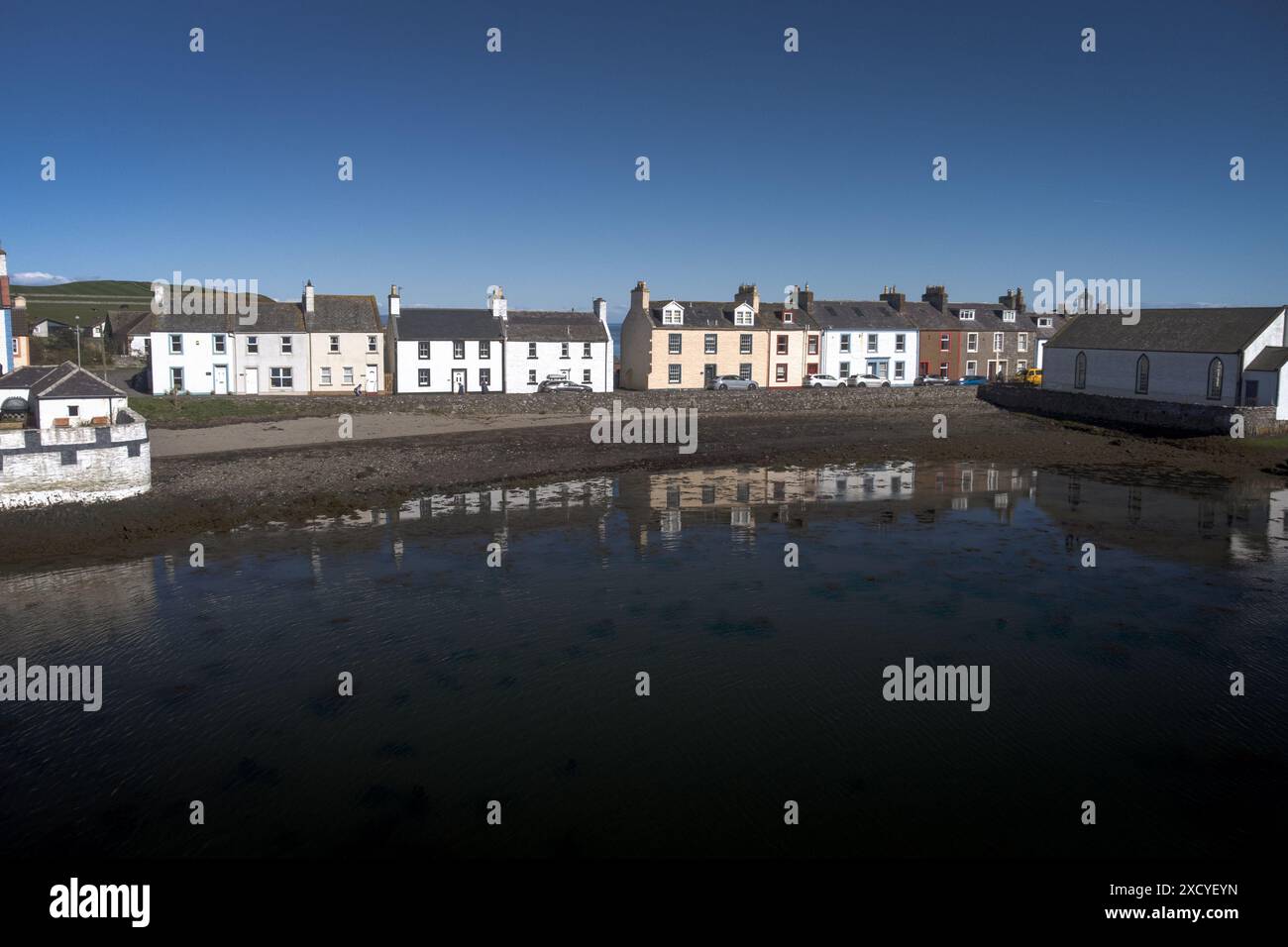 Aerial view of Main street from above the water of the harbour in the ...