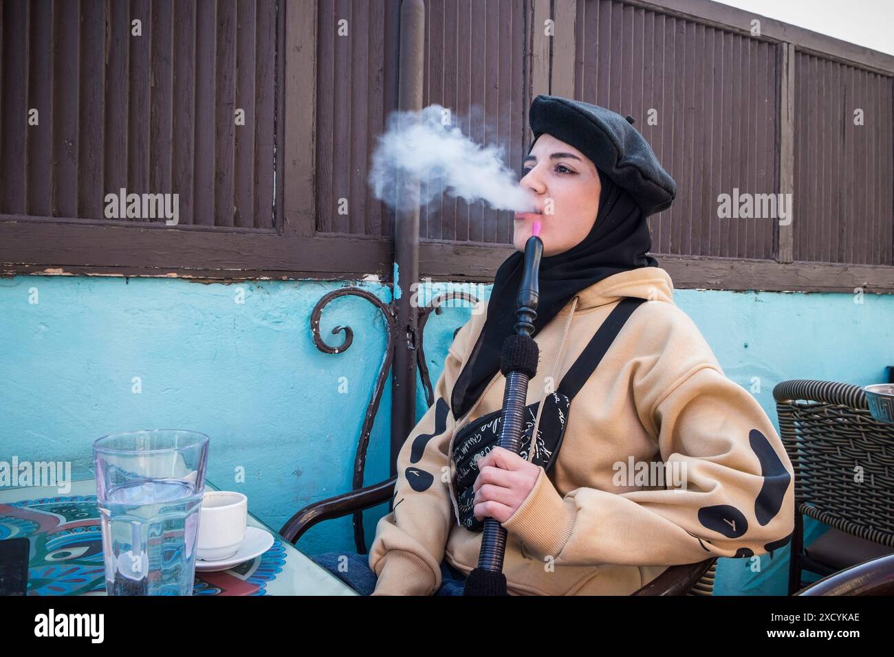 Syria, Damascus, girl smoking shisha Stock Photo - Alamy
