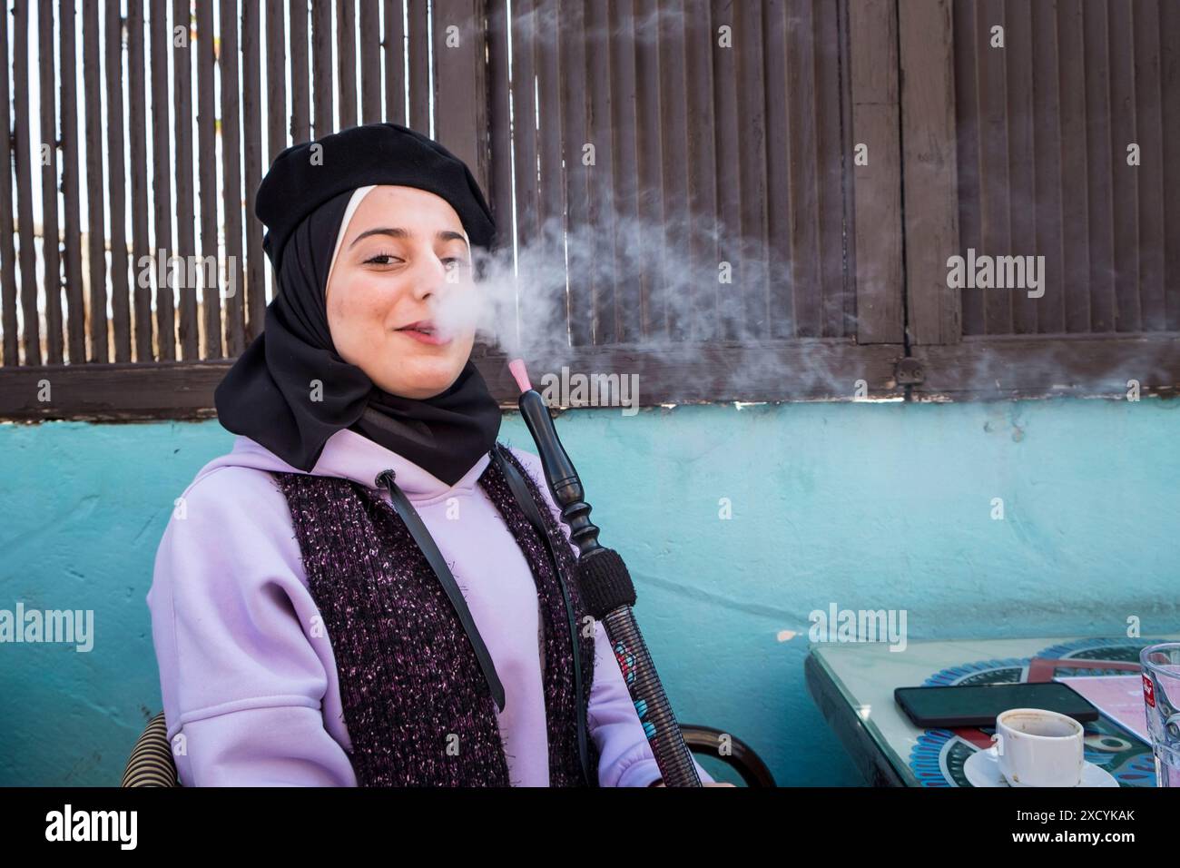 Syria, Damascus, girl smoking shisha Stock Photo - Alamy