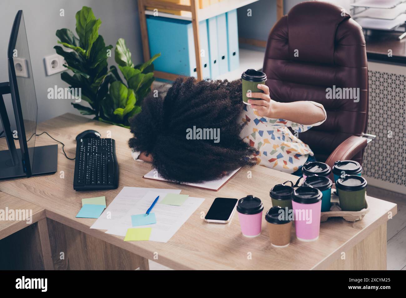 Photo of charming young woman lying table chair sleeping in office room ...