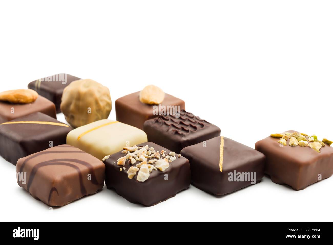Assorted chocolates on white background Stock Photo - Alamy