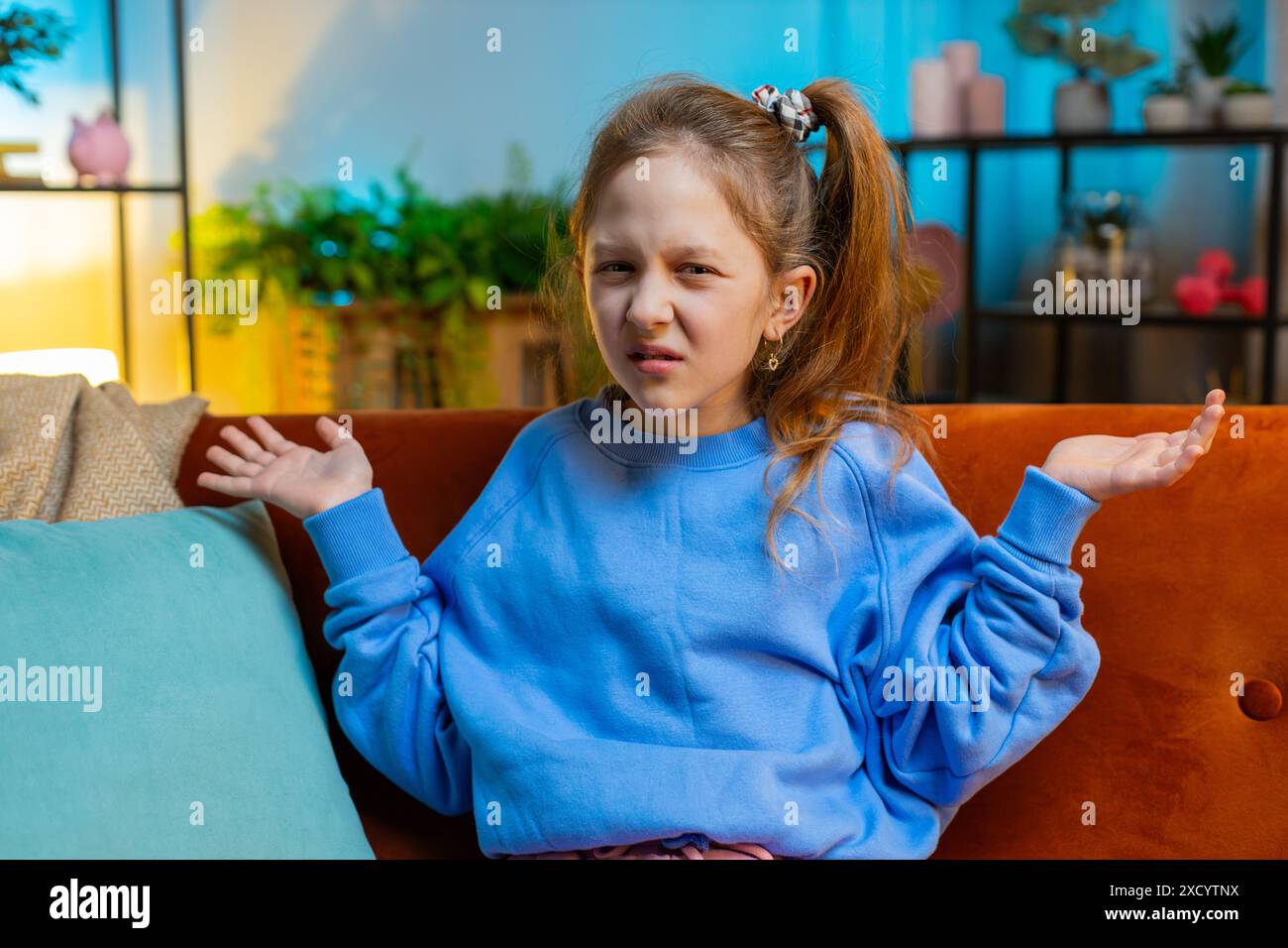 What. Why. Young child girl raising hands in indignant expression ...