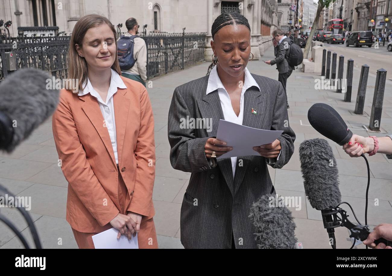 Ella Janneh (right) speaks to the media outside the Royal Courts of ...