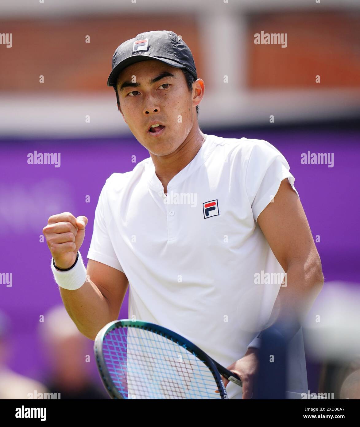 Rinky Hijikata in action against Matteo Arnaldi on day five of the cinch Championships at The ...