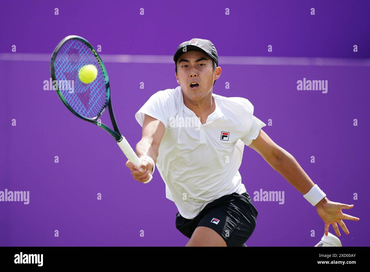 Rinky Hijikata in action against Matteo Arnaldi on day five of the cinch Championships at The ...