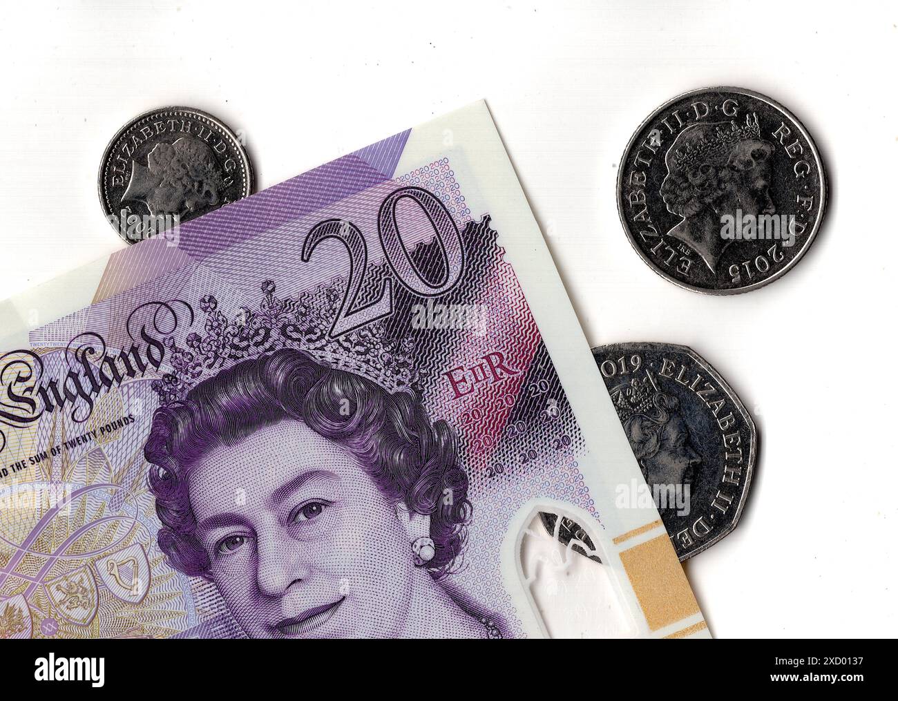 silver coins and a modern £20 polymer banknote from the United Kingdom ...