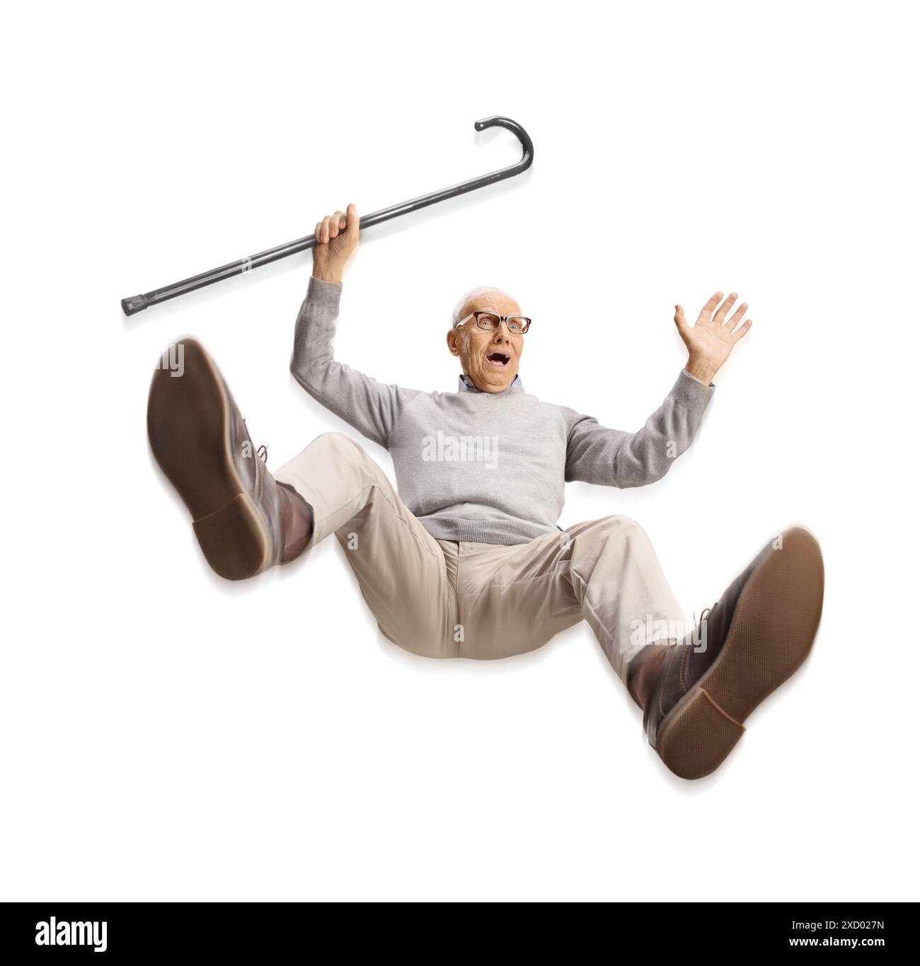 Scared elderly man with a cane falling isolated on white background ...