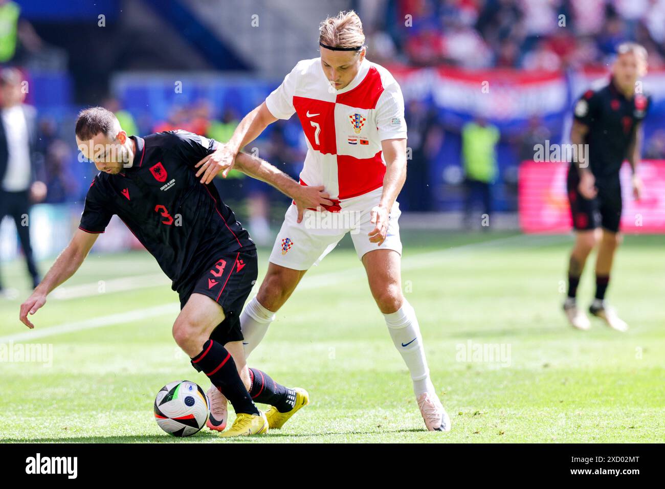 HAMBURG, GERMANY - JUNE 19: Mario Mitaj of Albania and Lovro Majer of ...