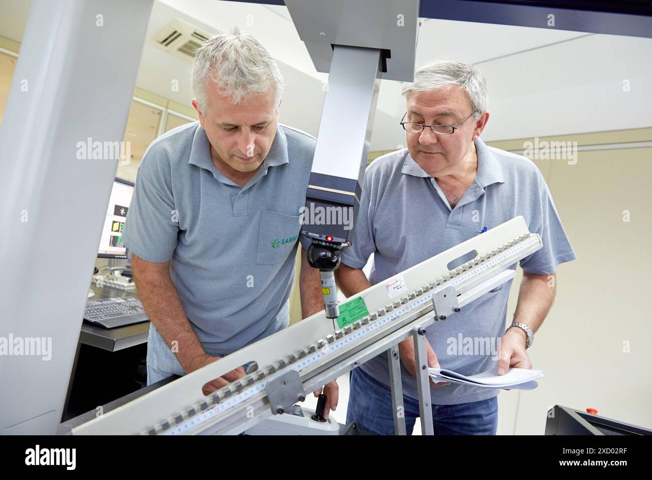 The SAT team calibrating three-dimensional machine. Calibration of CMM ...