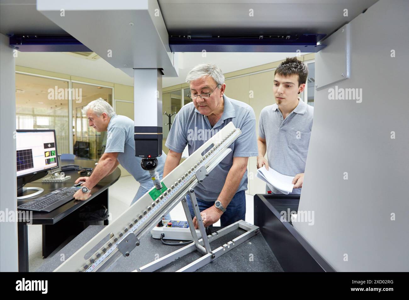 The SAT team calibrating three-dimensional machine. Calibration of CMM ...