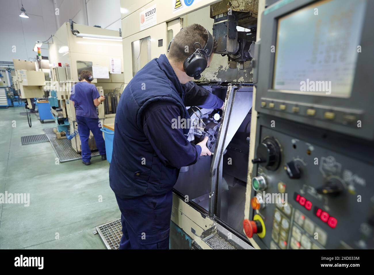 Tuning mooring. Checking with dial indicator. Area automated CNC lathes ...