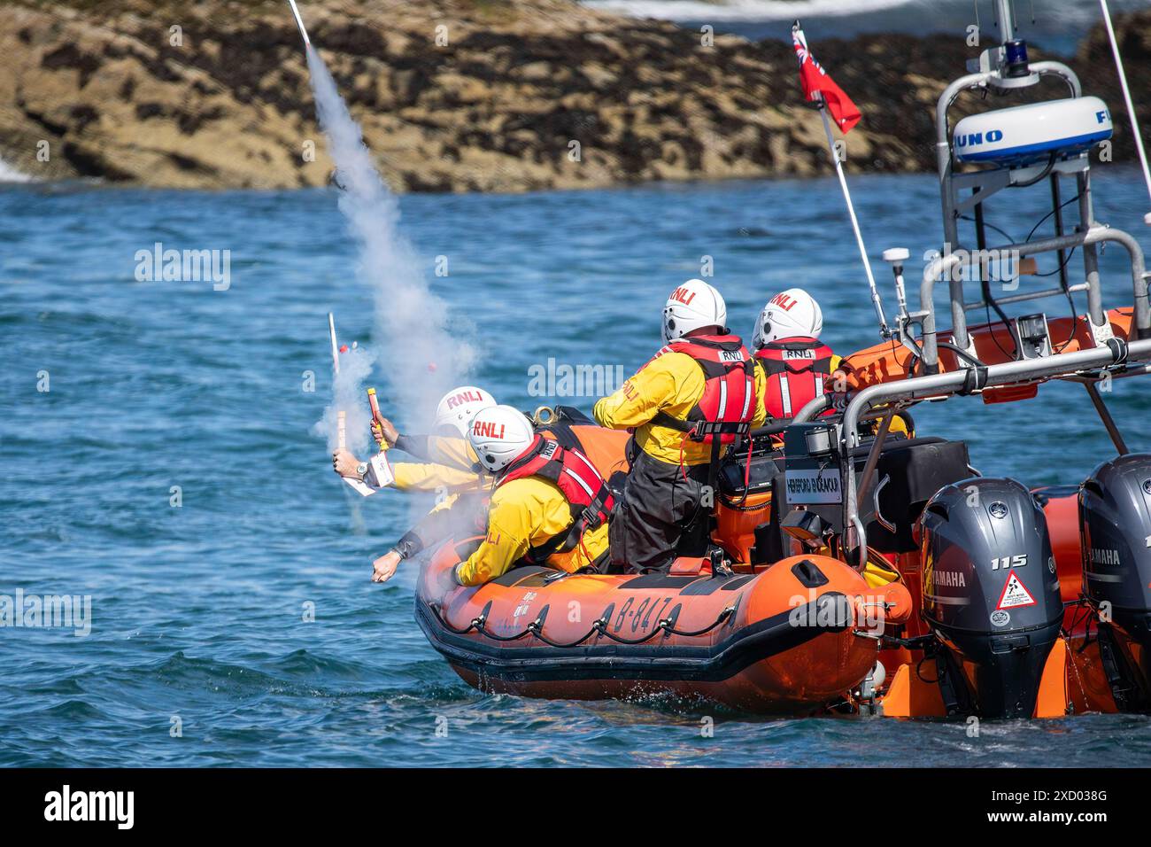 Lifeboat Crew launching illumination flares Stock Photo - Alamy