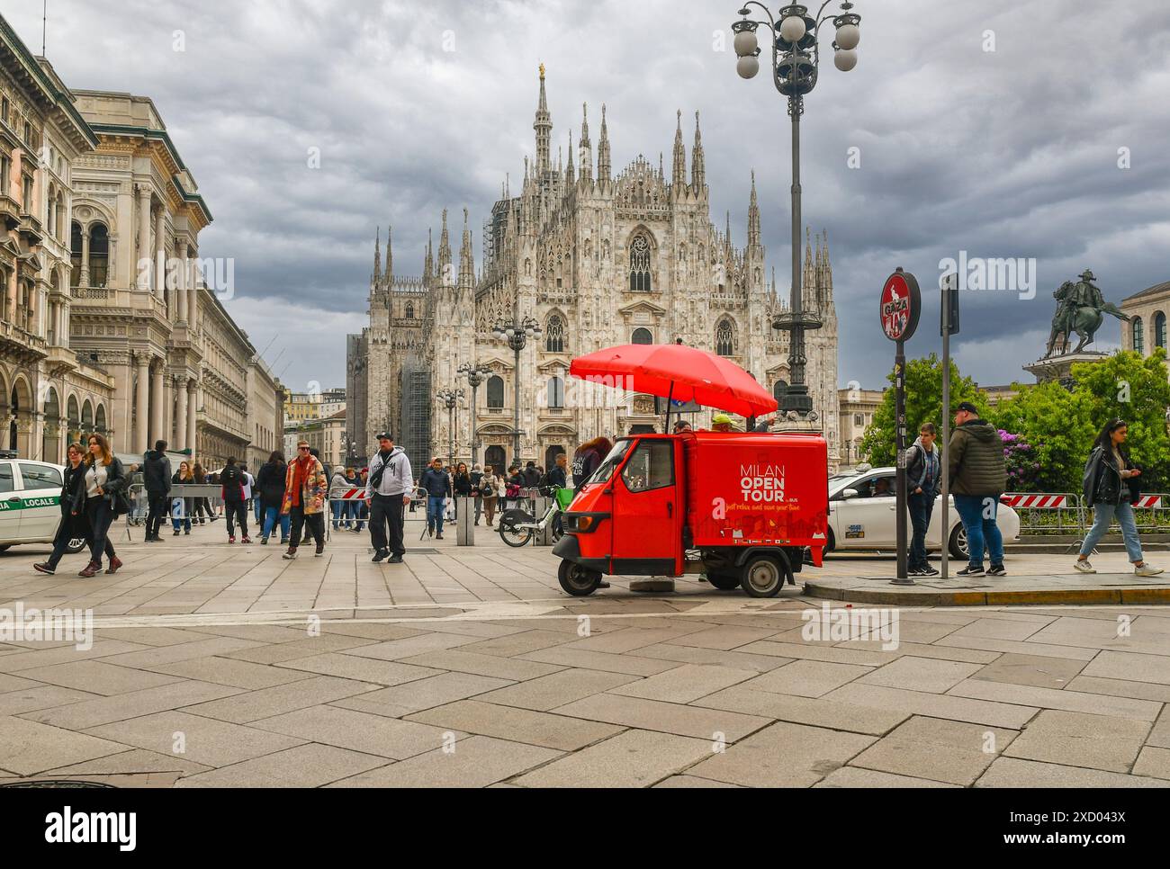 Red Piaggio Ape Car of the Milan Open Tour tourist buses in Piazza del ...