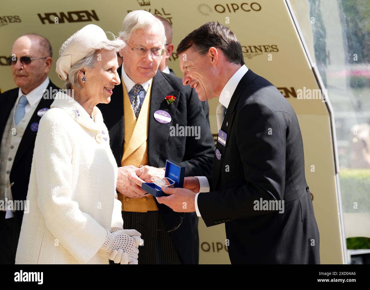 Trainer Aidan O'Brien is presented with a winners medal by The Duke and ...