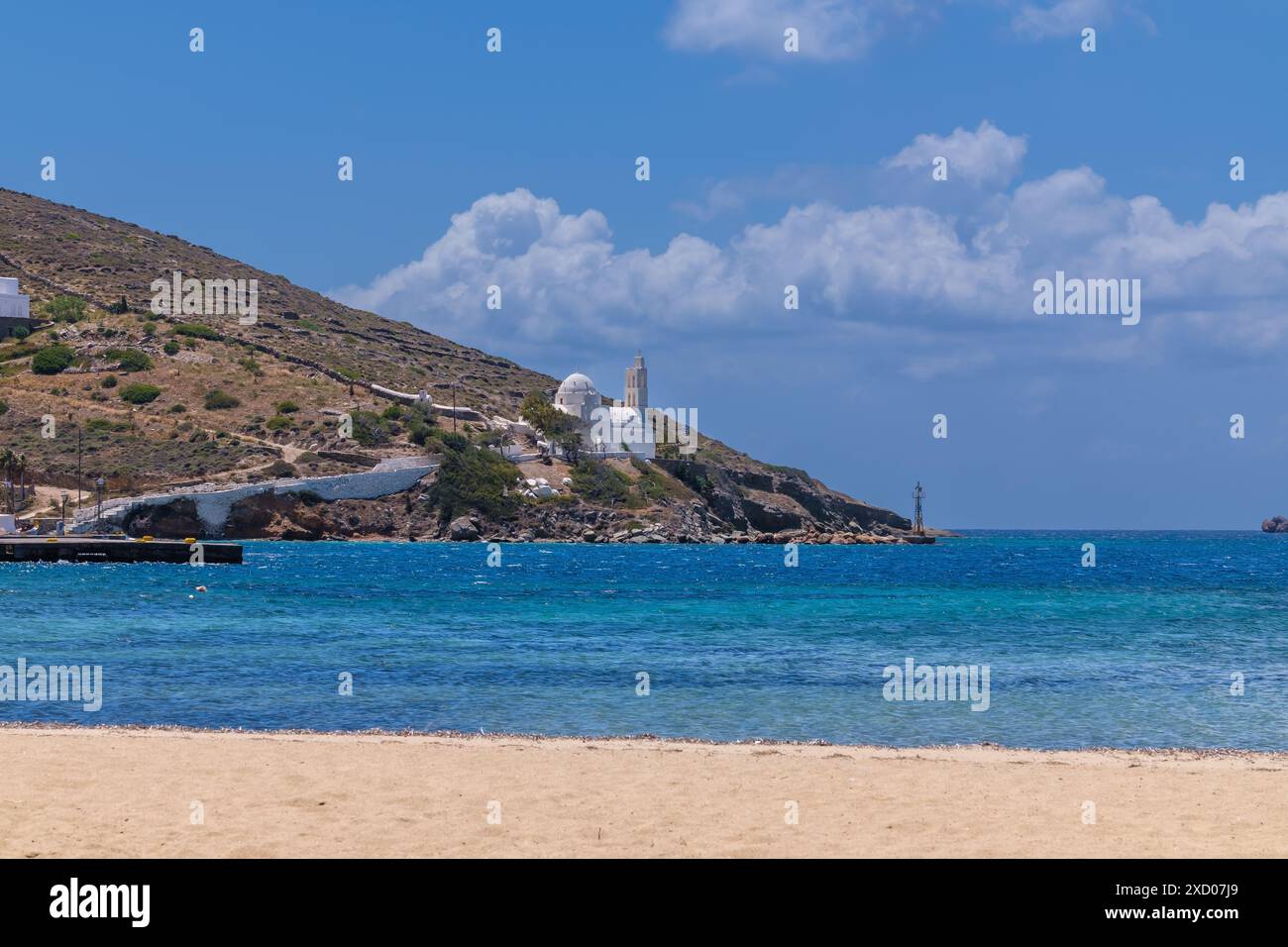 View of the church Saint Irene from the sandy Gialos beach in Ios ...