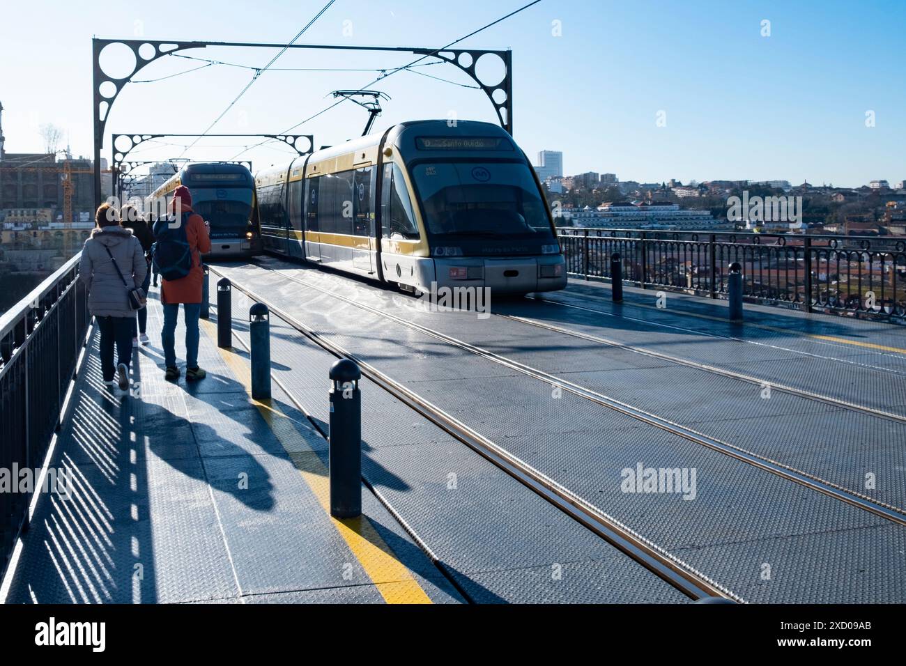 Modern Trams Crossing Dom Luis I Bridge in Porto, Portugal. Modern tram ...