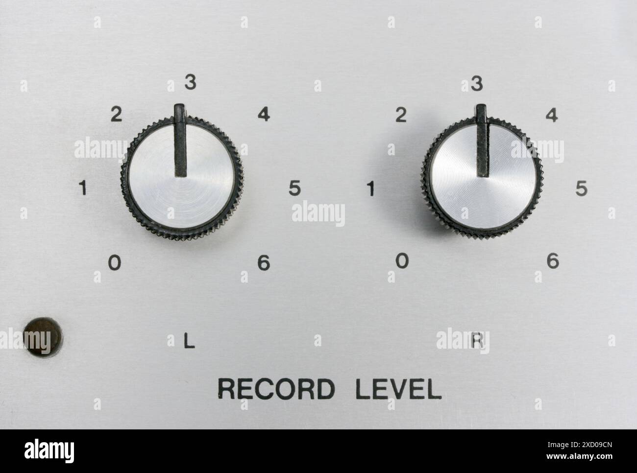 Aluminium stereo Audio level control knobs Stock Photo - Alamy