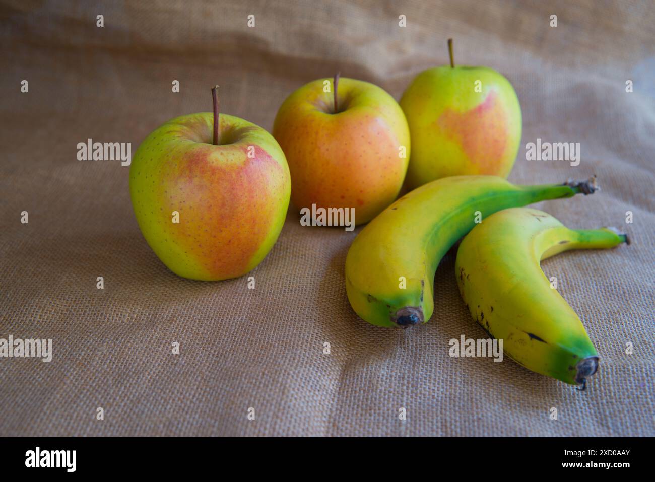 Three apples and two bananas. Still life Stock Photo - Alamy